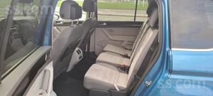 Blue Volkswagen Touran 2015 in Riga, with an engine capacity of 1.40 L and mileage of 147 thousand km for 12500 €, photo 7 on AUTOMOTO.COM.LV