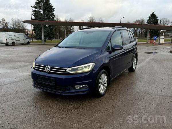 Blue Volkswagen Touran 2016 in Ogre, with an engine capacity of 2.00 L and mileage of 241 thousand km for 10590 €, photo 1 on AUTOMOTO.COM.LV
