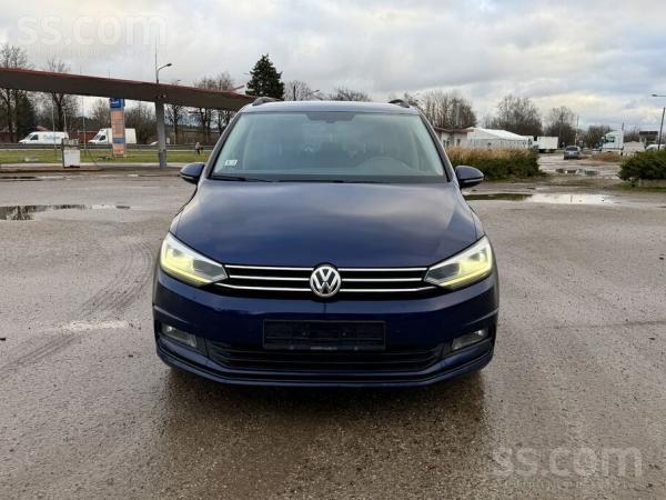 Blue Volkswagen Touran 2016 in Ogre, with an engine capacity of 2.00 L and mileage of 241 thousand km for 10590 €, photo 2 on AUTOMOTO.COM.LV