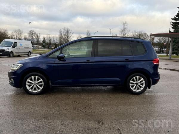 Blue Volkswagen Touran 2016 in Ogre, with an engine capacity of 2.00 L and mileage of 241 thousand km for 10590 €, photo 5 on AUTOMOTO.COM.LV