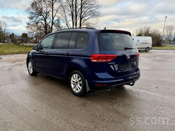 Blue Volkswagen Touran 2016 in Ogre, with an engine capacity of 2.00 L and mileage of 241 thousand km for 10590 €, photo 8 on AUTOMOTO.COM.LV