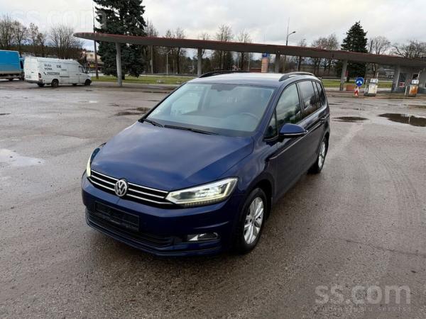 Blue Volkswagen Touran 2016 in Ogre, with an engine capacity of 2.00 L and mileage of 241 thousand km for 10590 €, photo 9 on AUTOMOTO.COM.LV