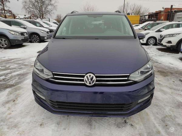 Blue Volkswagen Touran 2016 in Panevezys, with an engine capacity of 1.60 L and mileage of 143 thousand km for 11700 €, photo 4 on AUTOMOTO.COM.LV