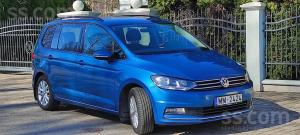 Blue Volkswagen Touran 2016 in Riga, with an engine capacity of 1.60 L and mileage of 267 thousand km for 8900 €, photo  on AUTOMOTO.COM.LV