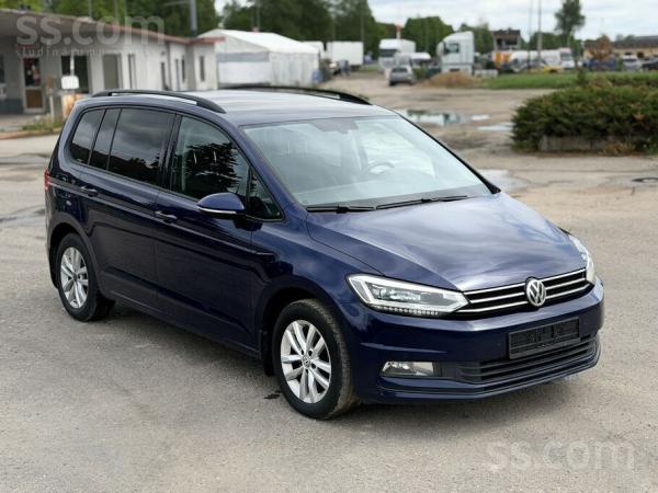 Blue Volkswagen Touran 2016 in Ogre, with an engine capacity of 2.00 L and mileage of 242 thousand km for 10290 €, photo 10 on AUTOMOTO.COM.LV