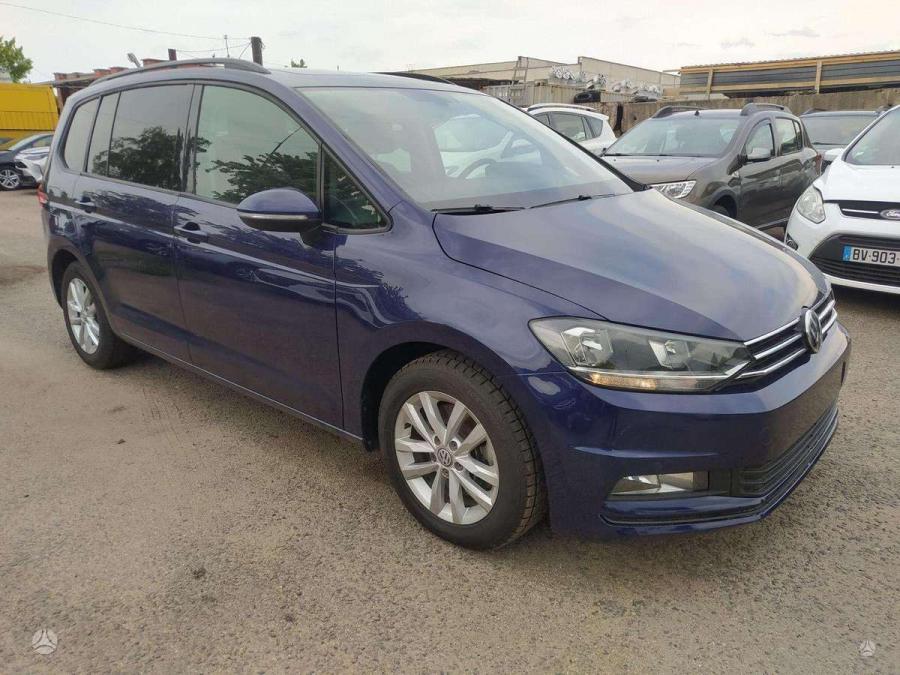 Blue Volkswagen Touran 2016 in Panevezys, with an engine capacity of 1.60 L and mileage of 143 thousand km for 9700 €, photo 1 on AUTOMOTO.COM.LV