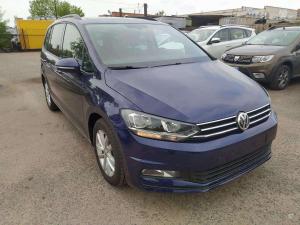Blue Volkswagen Touran 2016 in Panevezys, with an engine capacity of 1.60 L and mileage of 143 thousand km for 9700 €, photo 4 on AUTOMOTO.COM.LV