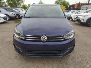 Blue Volkswagen Touran 2016 in Panevezys, with an engine capacity of 1.60 L and mileage of 143 thousand km for 9700 €, photo 5 on AUTOMOTO.COM.LV