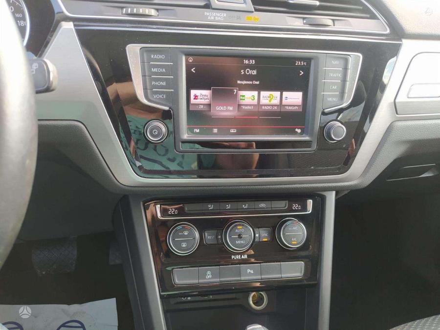 Blue Volkswagen Touran 2016 in Panevezys, with an engine capacity of 1.60 L and mileage of 143 thousand km for 9700 €, photo 23 on AUTOMOTO.COM.LV