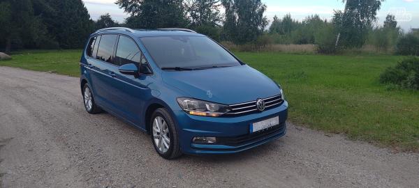 Blue Volkswagen Touran 2016 in Kaunas, with an engine capacity of 1.60 L and mileage of 329 thousand km for 8500 €, photo 3 on AUTOMOTO.COM.LV