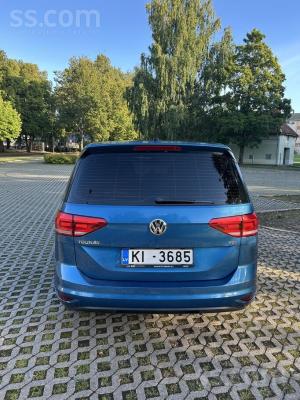 Blue Volkswagen Touran 2016 in Cesis, with an engine capacity of 1.60 L and mileage of 232 thousand km for 9500 €, photo 4 on AUTOMOTO.COM.LV