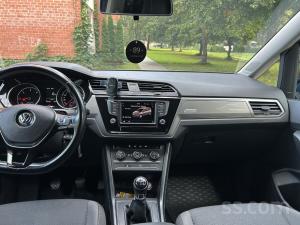 Blue Volkswagen Touran 2016 in Cesis, with an engine capacity of 1.60 L and mileage of 232 thousand km for 9500 €, photo 7 on AUTOMOTO.COM.LV