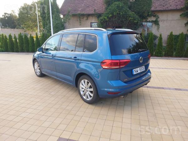 Zils Volkswagen Touran 2017 Rīga, ar dzinēja tilpumu 2.00 L un nobraukumu 239 tūkst. km par 10500 €, foto 5 vietnē AUTOMOTO.COM.LV