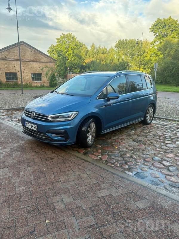Volkswagen Touran 2017 Kuldīga vietnē Zils Volkswagen Touran 2017 Kuldīga, ar dzinēja tilpumu 1.40 L un nobraukumu 128 tūkst. km par 16500 €, foto 1 vietnē AUTOMOTO.COM.LV