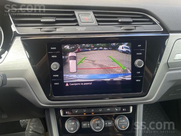 Blue Volkswagen Touran 2018 in Riga, with an engine capacity of 1.40 L and mileage of 120 thousand km for 14800 €, photo 1 on AUTOMOTO.COM.LV