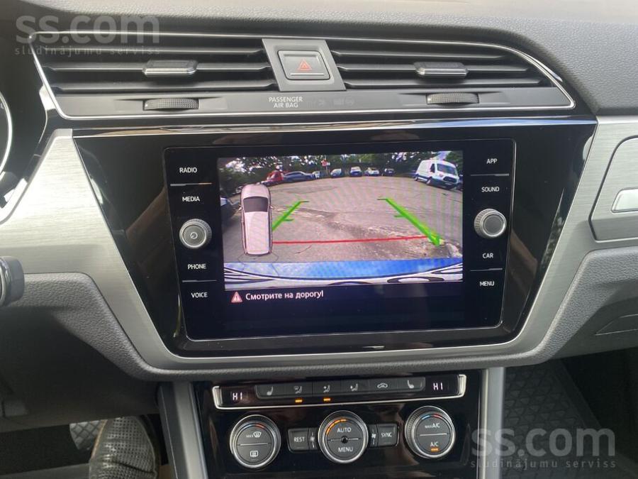 Blue Volkswagen Touran 2018 in Riga, with an engine capacity of 1.40 L and mileage of 120 thousand km for 14800 €, photo 1 on AUTOMOTO.COM.LV