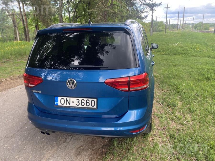 Blue Volkswagen Touran 2018 in Riga, with an engine capacity of 1.40 L and mileage of 120 thousand km for 14800 €, photo 7 on AUTOMOTO.COM.LV