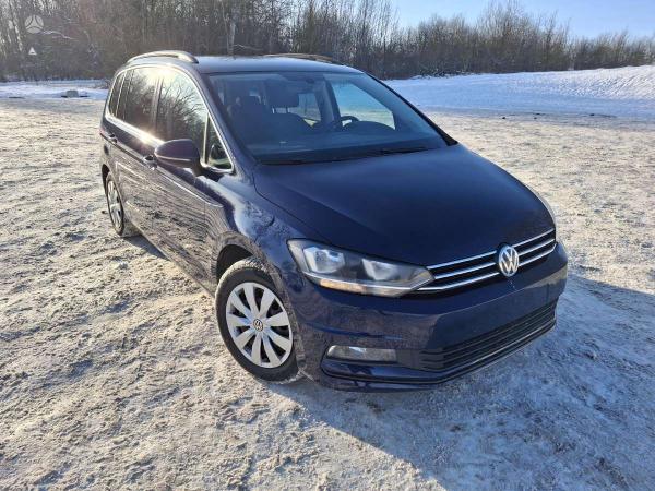 Blue Volkswagen Touran 2019 in Kaunas, with an engine capacity of 1.97 L and mileage of 238 thousand km for 9650 €, photo 3 on AUTOMOTO.COM.LV