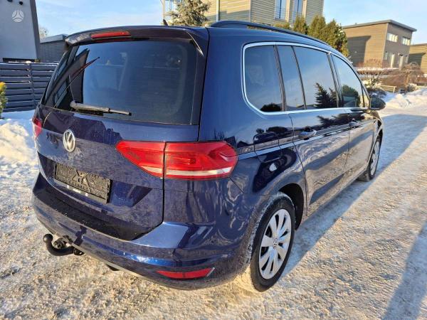 Blue Volkswagen Touran 2019 in Kaunas, with an engine capacity of 1.97 L and mileage of 238 thousand km for 9650 €, photo 8 on AUTOMOTO.COM.LV