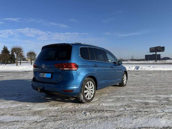 Blue Volkswagen Touran 2019 in Kaunas, with an engine capacity of 1.50 L and mileage of 67 thousand km for 24500 €, photo 3 on AUTOMOTO.COM.LV