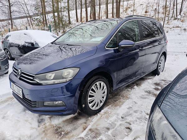 Blue Volkswagen Touran 2020 in Kaunas, with an engine capacity of 1.97 L and mileage of 289 thousand km for 10600 €, photo 7 on AUTOMOTO.COM.LV