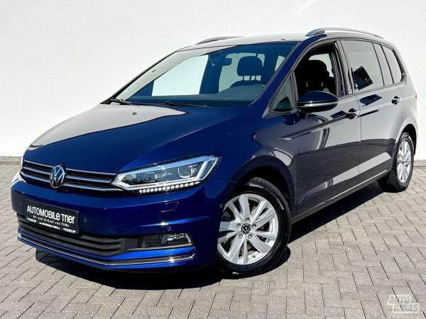 Blue Volkswagen Touran 2021 in Kaunas, with an engine capacity of 1.50 L and mileage of 25 thousand km for 32690 €, photo 1 on AUTOMOTO.COM.LV