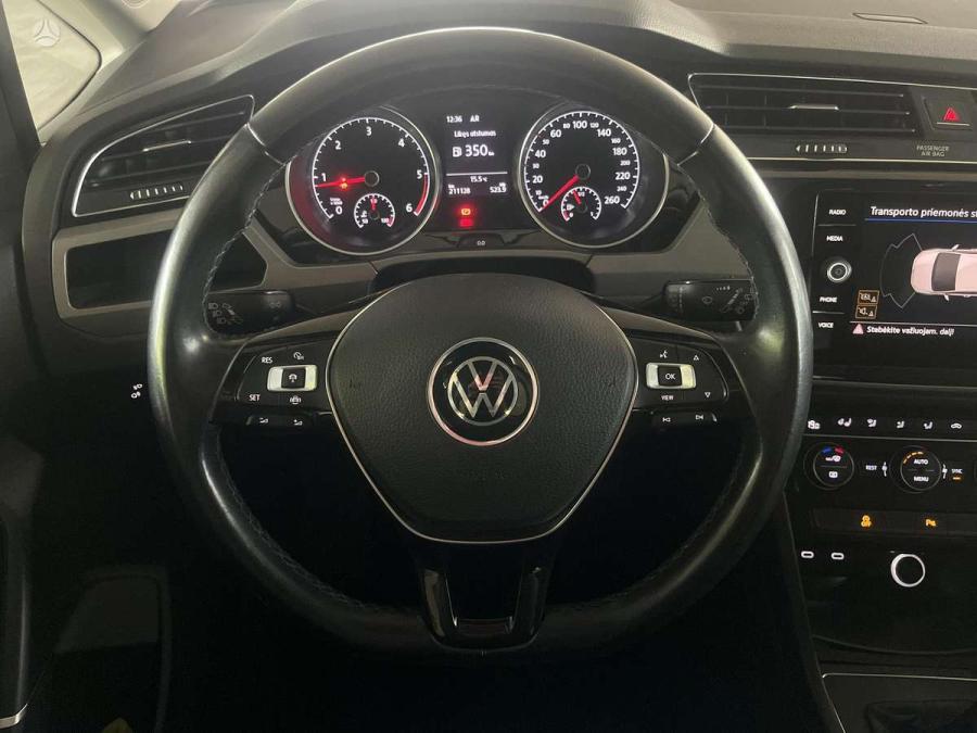 Blue Volkswagen Touran 2022 in Vilnius, with an engine capacity of 1.97 L and mileage of 211 thousand km for 13490 €, photo 14 on AUTOMOTO.COM.LV