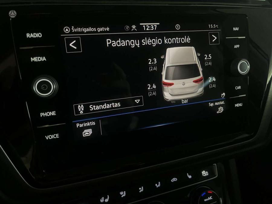 Blue Volkswagen Touran 2022 in Vilnius, with an engine capacity of 1.97 L and mileage of 211 thousand km for 13490 €, photo 26 on AUTOMOTO.COM.LV