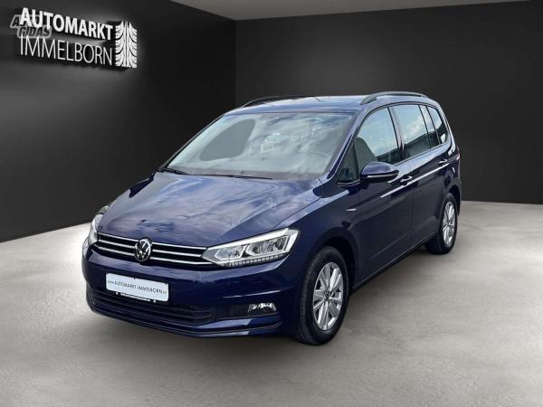 Blue Volkswagen Touran 2023 in Kaunas, with an engine capacity of 1.50 L and mileage of 29 thousand km for 33104 €, photo 3 on AUTOMOTO.COM.LV