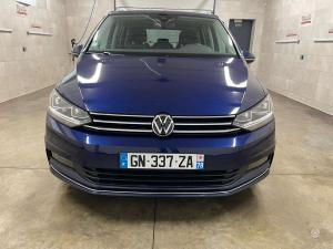 Blue Volkswagen Touran 2023 in Marijampole, with an engine capacity of 1.50 L and mileage of 189 thousand km for 17805 €, photo 3 on AUTOMOTO.COM.LV