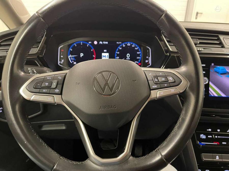 Blue Volkswagen Touran 2023 in Marijampole, with an engine capacity of 1.50 L and mileage of 189 thousand km for 17805 €, photo 15 on AUTOMOTO.COM.LV