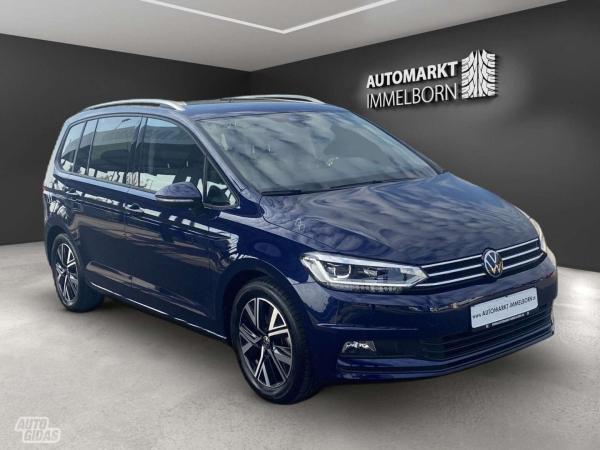 Blue Volkswagen Touran 2024 in Kaunas, with an engine capacity of 1.50 L and mileage of 23 thousand km for 33167 €, photo 1 on AUTOMOTO.COM.LV