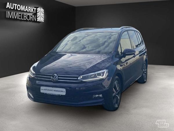 Blue Volkswagen Touran 2024 in Kaunas, with an engine capacity of 1.50 L and mileage of 23 thousand km for 33167 €, photo 3 on AUTOMOTO.COM.LV