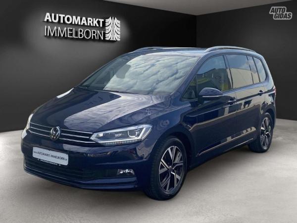 Blue Volkswagen Touran 2024 in Kaunas, with an engine capacity of 1.50 L and mileage of 23 thousand km for 33167 €, photo 4 on AUTOMOTO.COM.LV