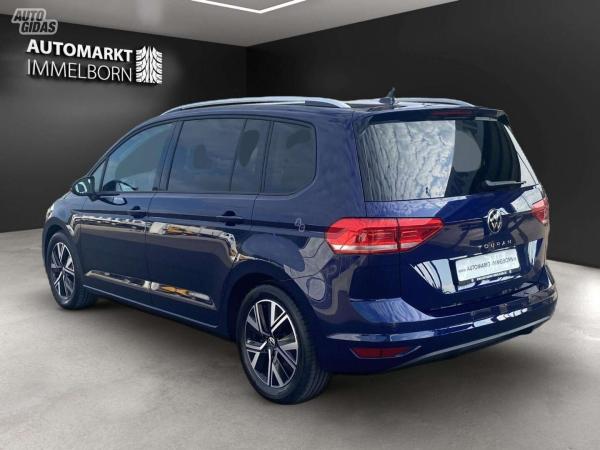 Blue Volkswagen Touran 2024 in Kaunas, with an engine capacity of 1.50 L and mileage of 23 thousand km for 33167 €, photo 5 on AUTOMOTO.COM.LV