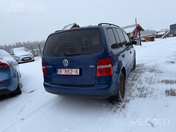 Zils Volkswagen Touran 2004 Talsi, ar dzinēja tilpumu 1.90 L un nobraukumu 225 tūkst. km par 970 €, foto 3 vietnē AUTOMOTO.COM.LV