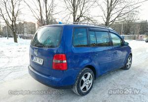 Blue Volkswagen Touran 2004 in Tallinn, with an engine capacity of 2.00 L and mileage of 328 thousand km for 1390 €, photo 3 on AUTOMOTO.COM.LV