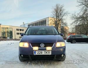 Blue Volkswagen Touran 2004 in Tallinn, with an engine capacity of 2.00 L and mileage of 328 thousand km for 1390 €, photo 7 on AUTOMOTO.COM.LV
