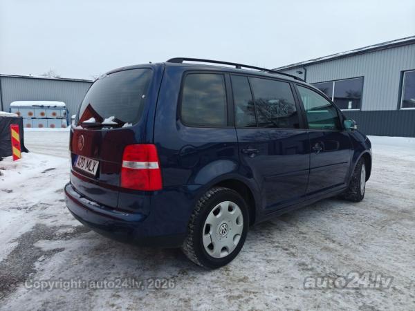 Blue Volkswagen Touran 2005 in Tartu, with an engine capacity of 1.90 L and mileage of 276 thousand km for 2650 €, photo 4 on AUTOMOTO.COM.LV