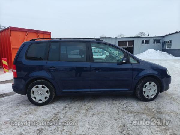 Blue Volkswagen Touran 2005 in Tartu, with an engine capacity of 1.90 L and mileage of 276 thousand km for 2650 €, photo 5 on AUTOMOTO.COM.LV