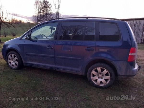 Zils Volkswagen Touran 2006 Tartu, ar dzinēja tilpumu 1.90 L un nobraukumu 0 tūkst. km par 1400 €, foto 1 vietnē AUTOMOTO.COM.LV
