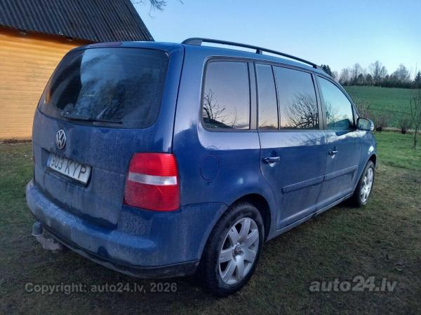 Zils Volkswagen Touran 2006 Tartu, ar dzinēja tilpumu 1.90 L un nobraukumu 0 tūkst. km par 1400 €, foto 2 vietnē AUTOMOTO.COM.LV