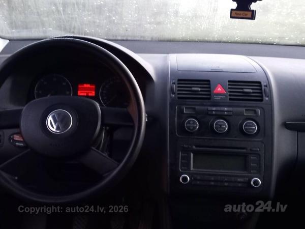 Zils Volkswagen Touran 2006 Tartu, ar dzinēja tilpumu 1.90 L un nobraukumu 0 tūkst. km par 1400 €, foto 4 vietnē AUTOMOTO.COM.LV