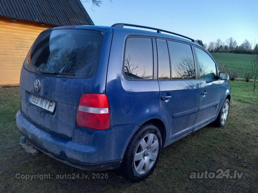 Blue Volkswagen Touran 2006 in Tartu, with an engine capacity of 1.90 L and mileage of 0 thousand km for 1400 €, photo 2 on AUTOMOTO.COM.LV