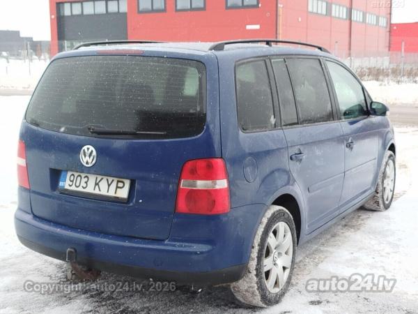 Zils Volkswagen Touran 2006 Tartu, ar dzinēja tilpumu 1.90 L un nobraukumu 396 tūkst. km par 1990 €, foto 6 vietnē AUTOMOTO.COM.LV