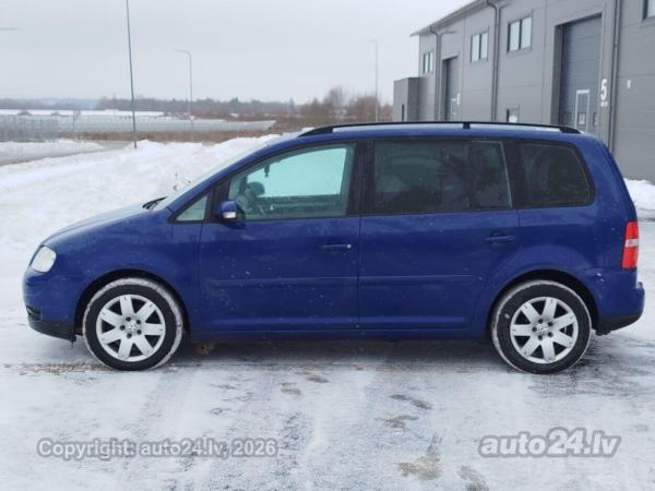 Zils Volkswagen Touran 2006 Tartu, ar dzinēja tilpumu 1.90 L un nobraukumu 396 tūkst. km par 1990 €, foto 8 vietnē AUTOMOTO.COM.LV