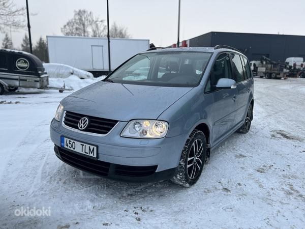 Blue Volkswagen Touran 2006 in Tallinn, with an engine capacity of 2.00 L and mileage of 224 thousand km for 2600 €, photo 1 on AUTOMOTO.COM.LV