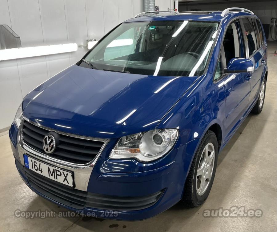 Blue Volkswagen Touran 2008 in Tallinn, with an engine capacity of 1.90 L and mileage of 234 thousand km for 2599 €, photo 2 on AUTOMOTO.COM.LV