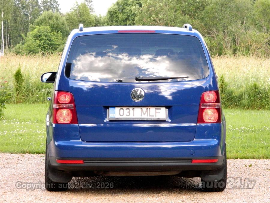 Zils Volkswagen Touran 2008 Viljandi, ar dzinēja tilpumu 1.60 L un nobraukumu 176 tūkst. km par 2490 €, foto 6 vietnē AUTOMOTO.COM.LV