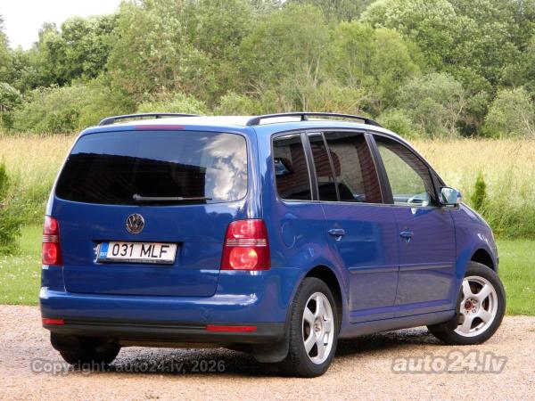 Blue Volkswagen Touran 2008 in Viljandi, with an engine capacity of 1.60 L and mileage of 176 thousand km for 2490 €, photo 6 on AUTOMOTO.COM.LV